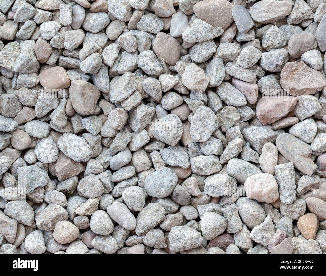 Small light gray, white stone outdoors garden road pavement structure ...