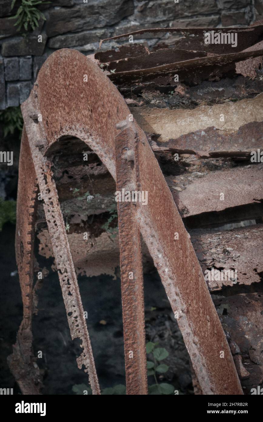 Rusty mill wheel in its traditional place in cutout. Close-up Stock ...