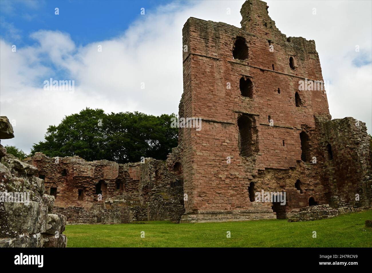 A view of the ruins of Norham Castle, a medieval building in ...