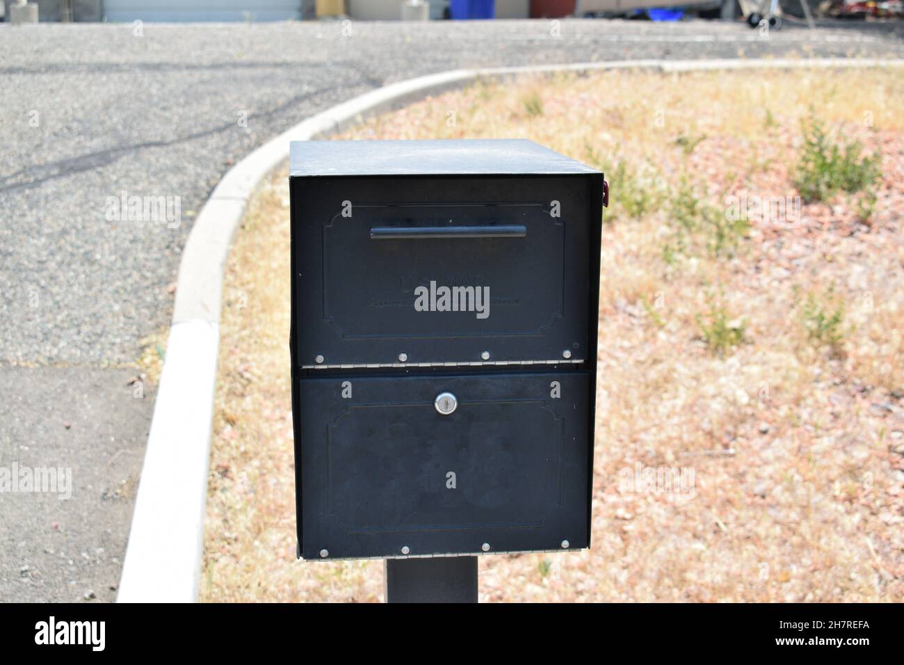 Front view of large black metal rural mailbox Stock Photo - Alamy
