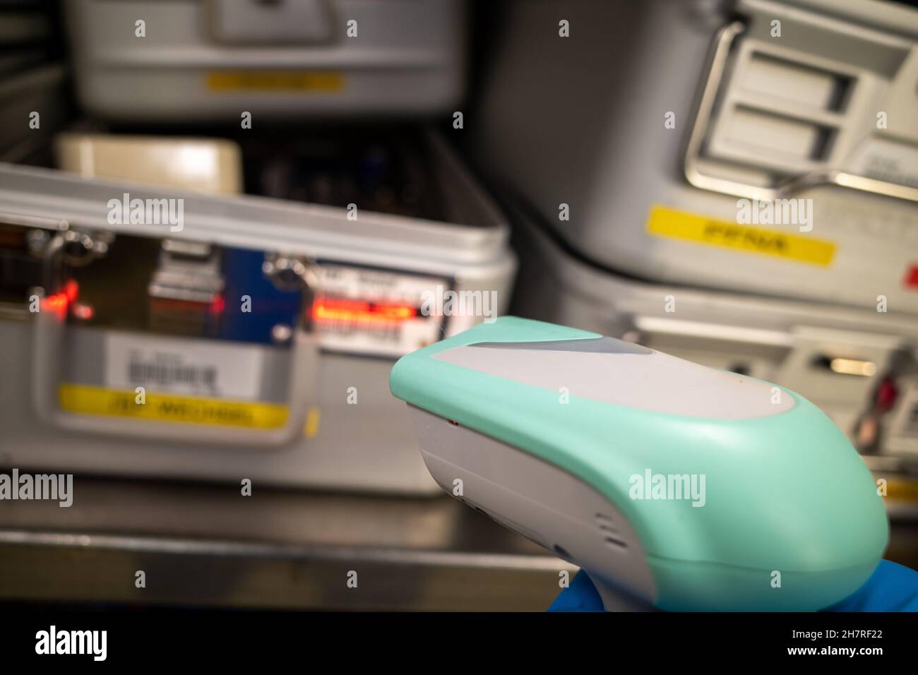 some Instrument containers are detected in an operating room with a ...