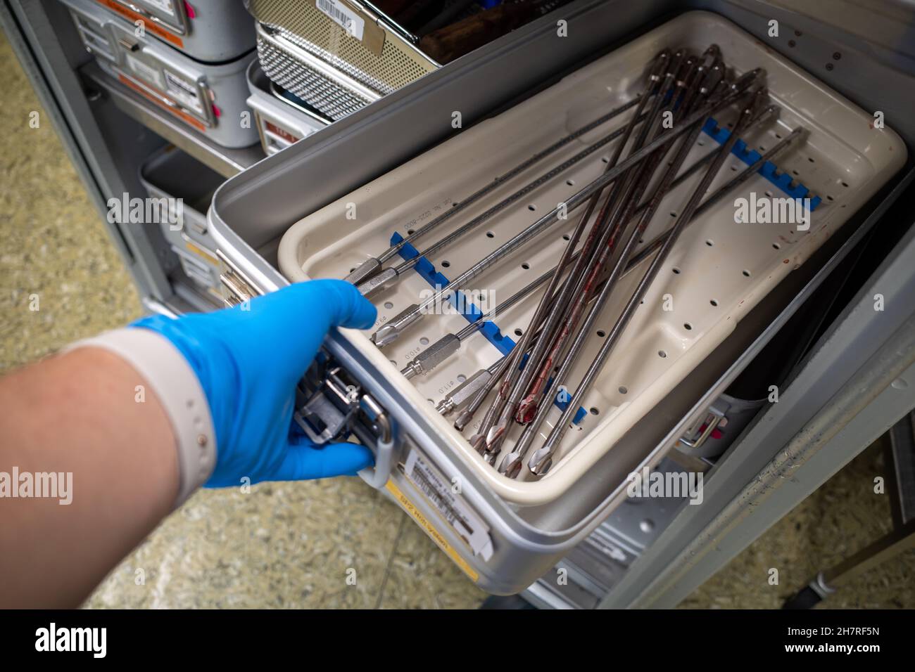 after an operation, the bloody instruments are cleaned in a steri Stock ...