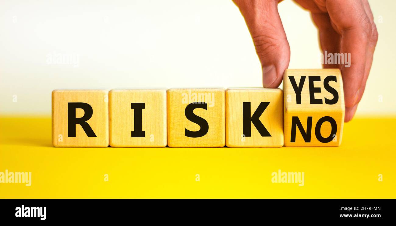 Question about Risk symbol. Businessman turns a wooden cube and changes ...