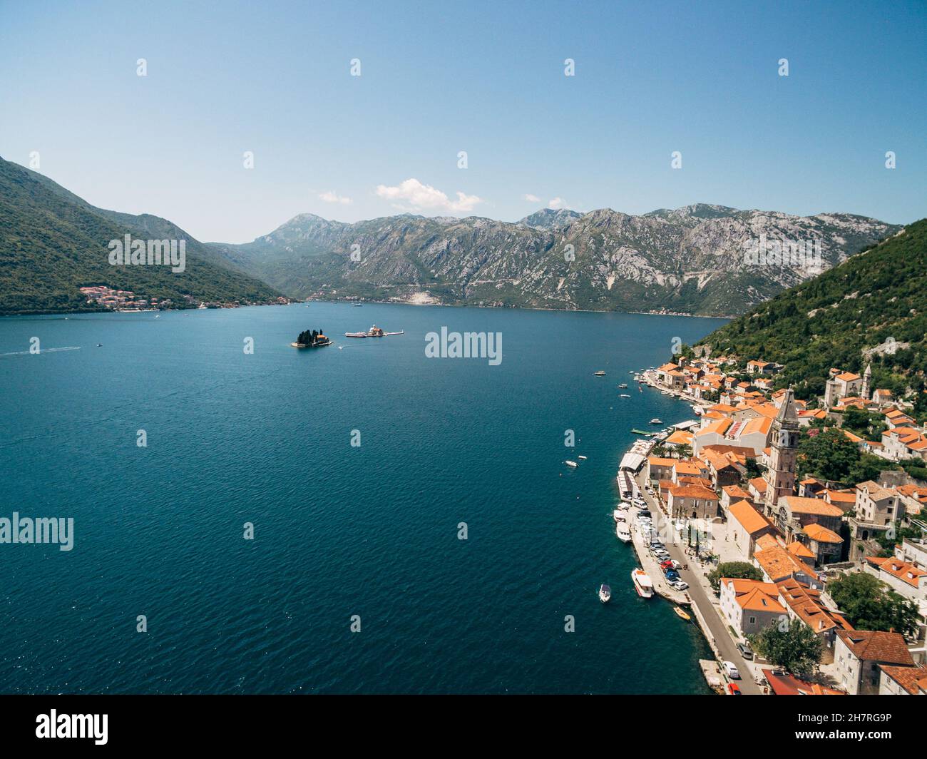 Aerial view of the coast of Perast and the islands of Gospa od Skrpjela ...