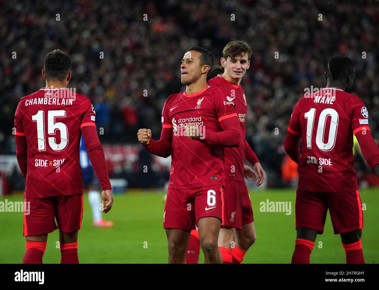 Liverpool's Thiago Alcantara (centre) celebrates scoring their side's ...