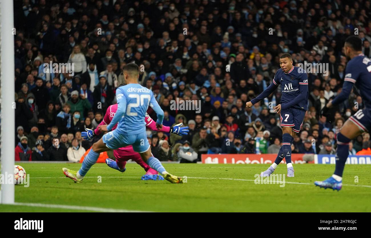 Paris Saint-Germain's Kylian Mbappe scores their side's first goal of ...