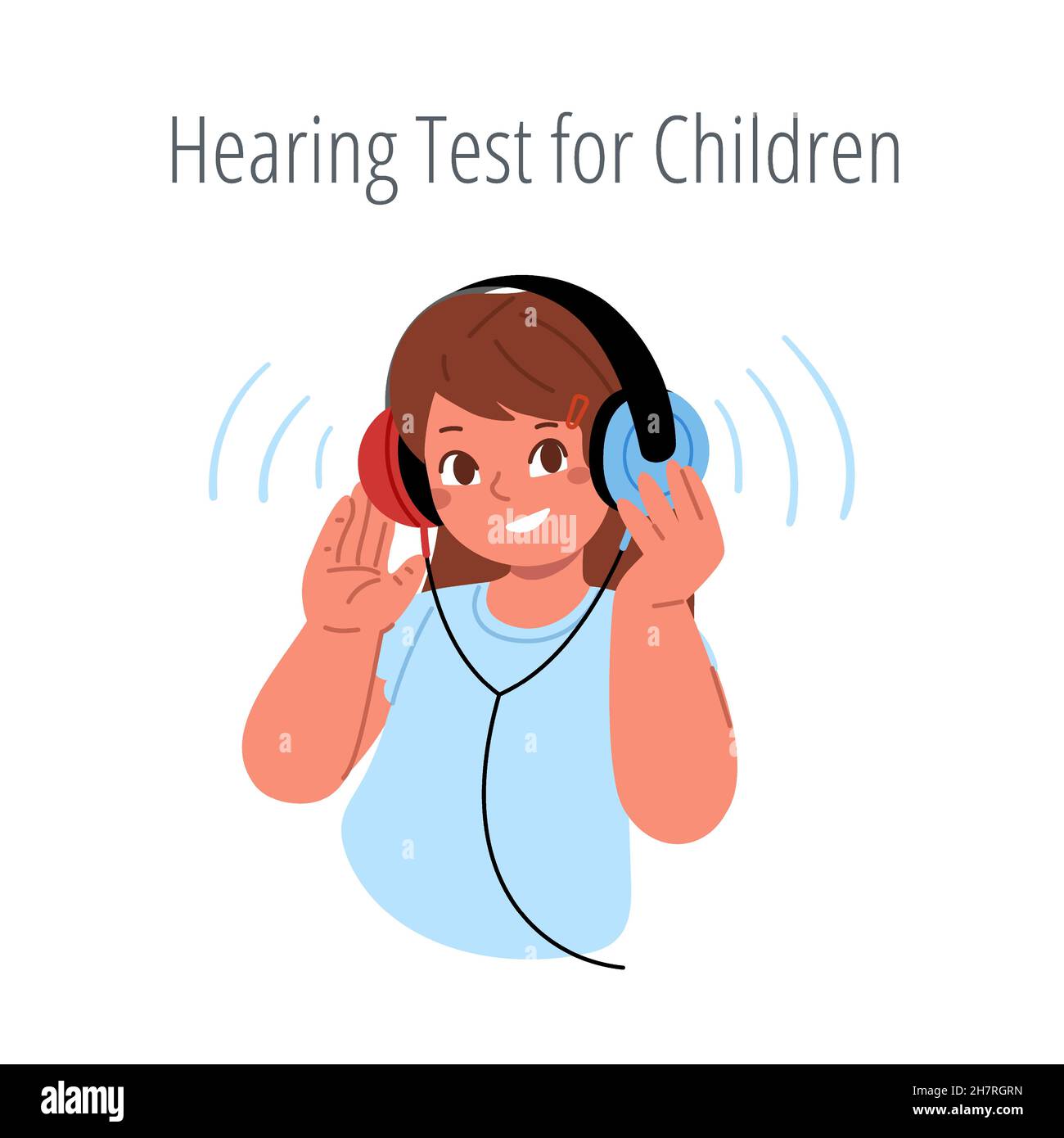 The smiling small girl is wearing headphones and taking a hearing test ...