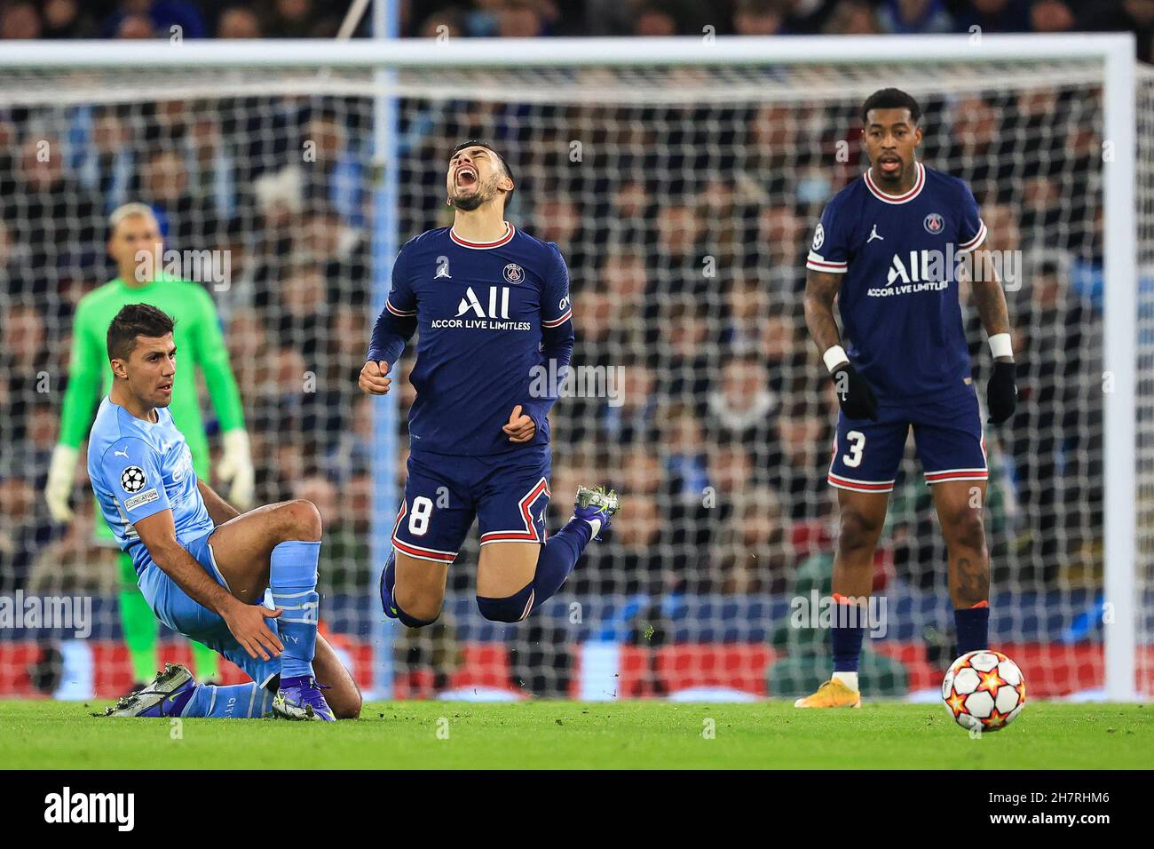 Leandro Paredes #8 of Paris Saint-Germain is fouled by Rodri #16 of ...