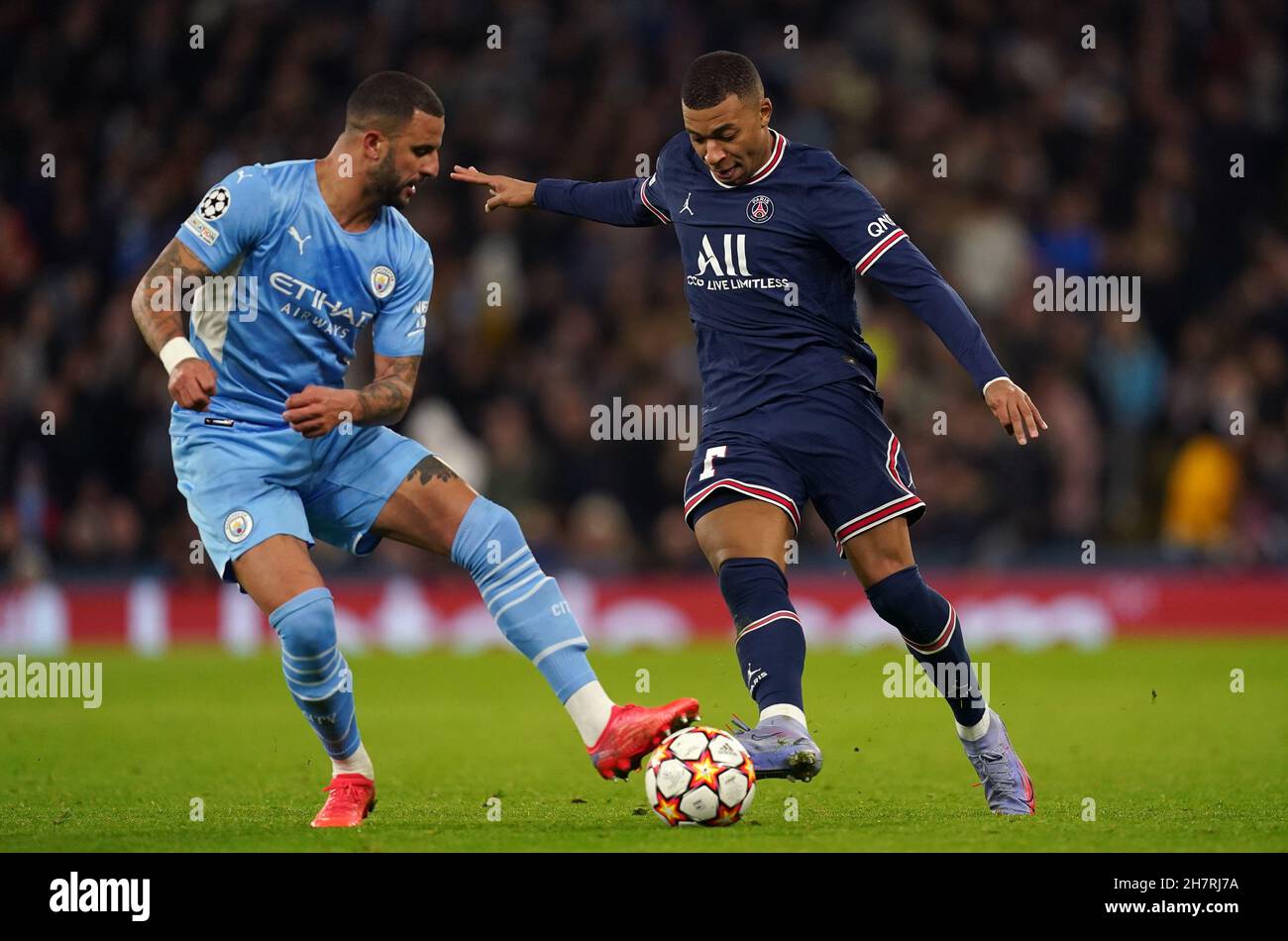 Manchester City's Kyle Walker (left) and Paris Saint-Germain's Kylian ...
