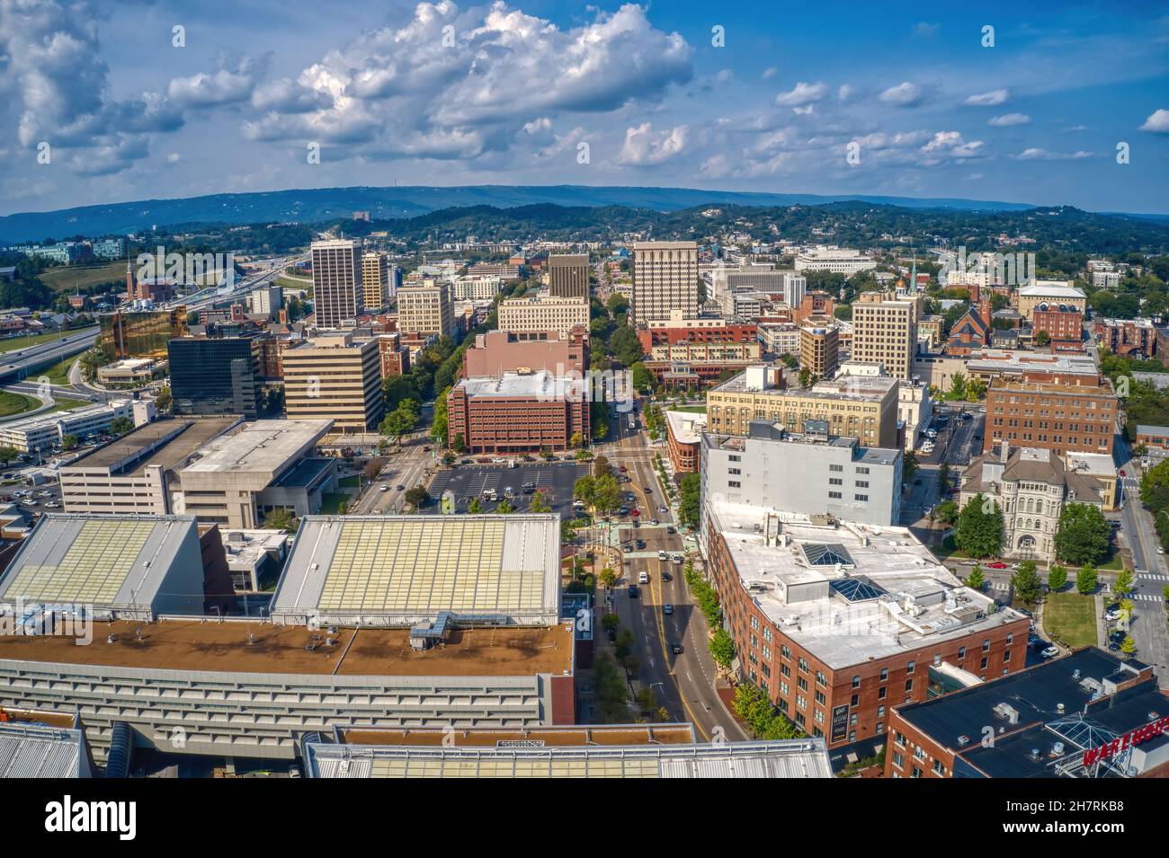 Aerial view of downtown Chattanooga with dense buildings under a blue ...