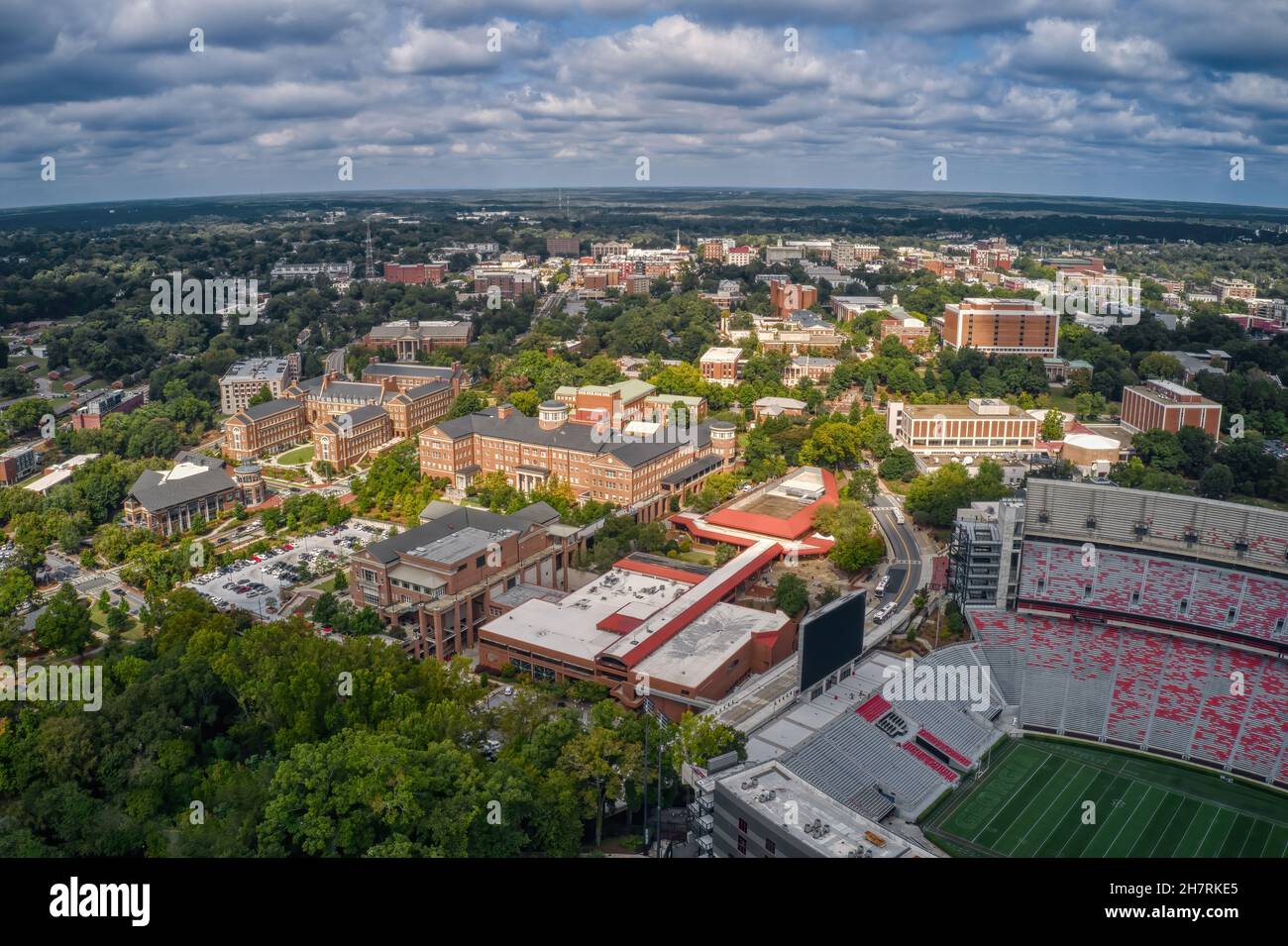 Aerial view of a Large Public University surrounded by dense buildings ...