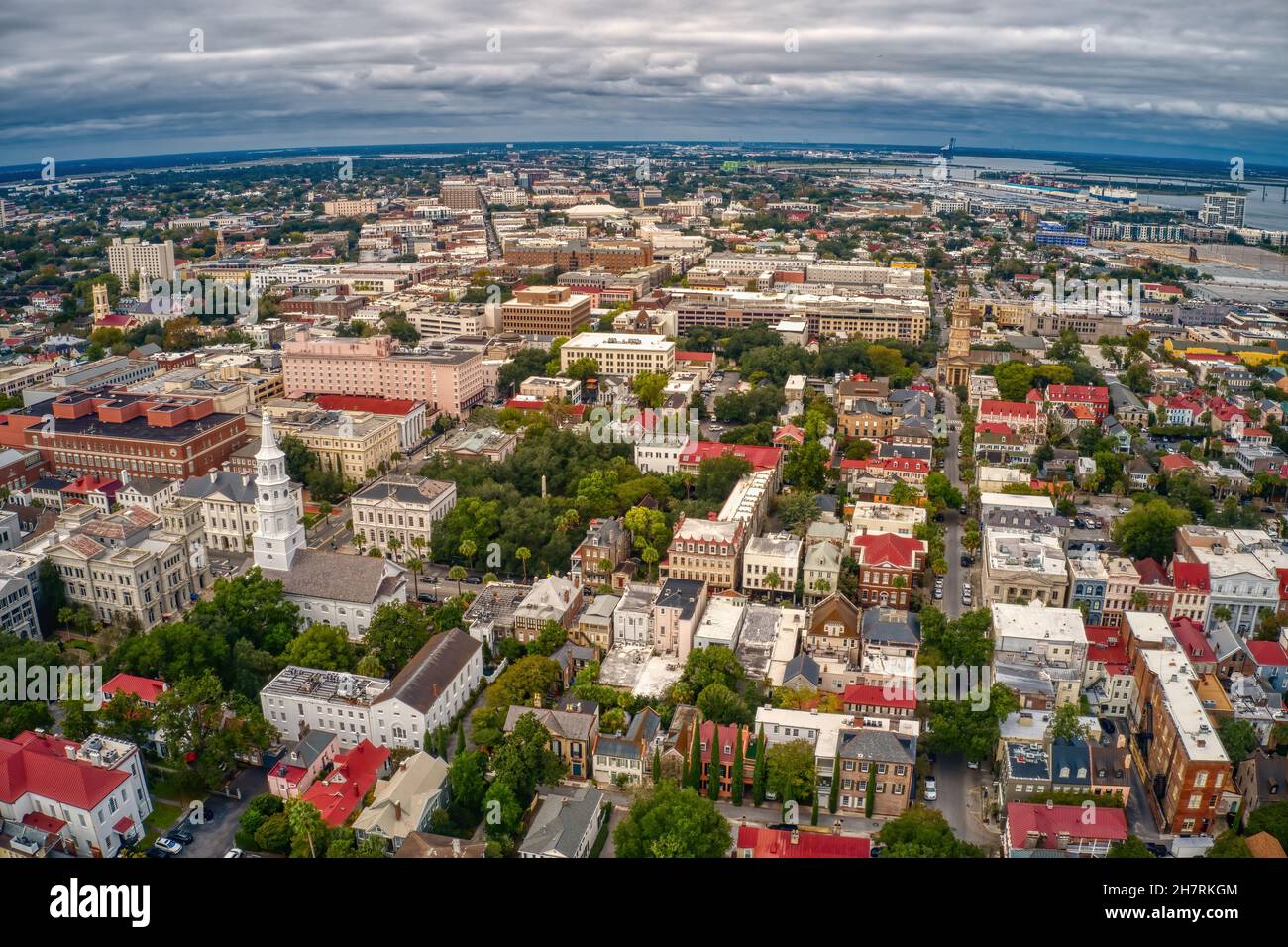 Beautiful aerial view of Charleston with dense buildings under a cloudy ...