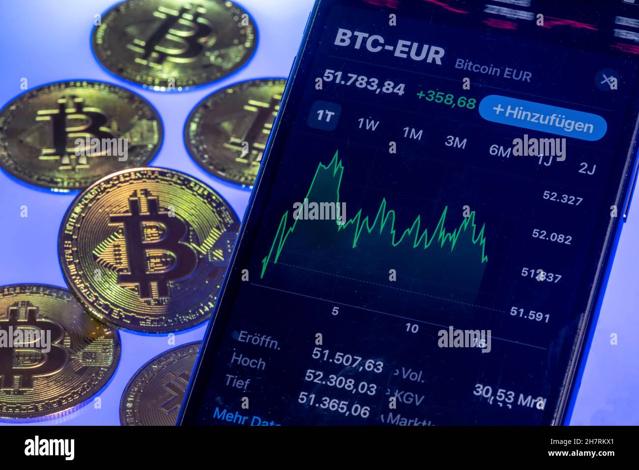 Bitcoin cryptocurrency, symbol coin, mobile phone, mobile phone with ...