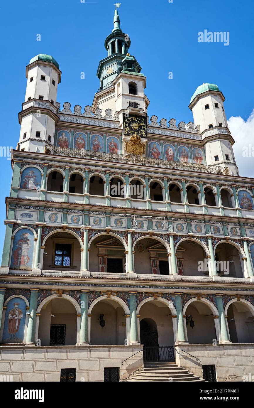 The facade with arcades of the historic Renaissance town hall in Poznan ...