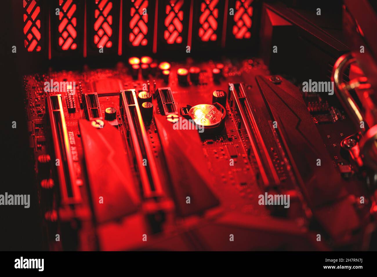 Computer mainboard components in close-up in red light Stock Photo - Alamy