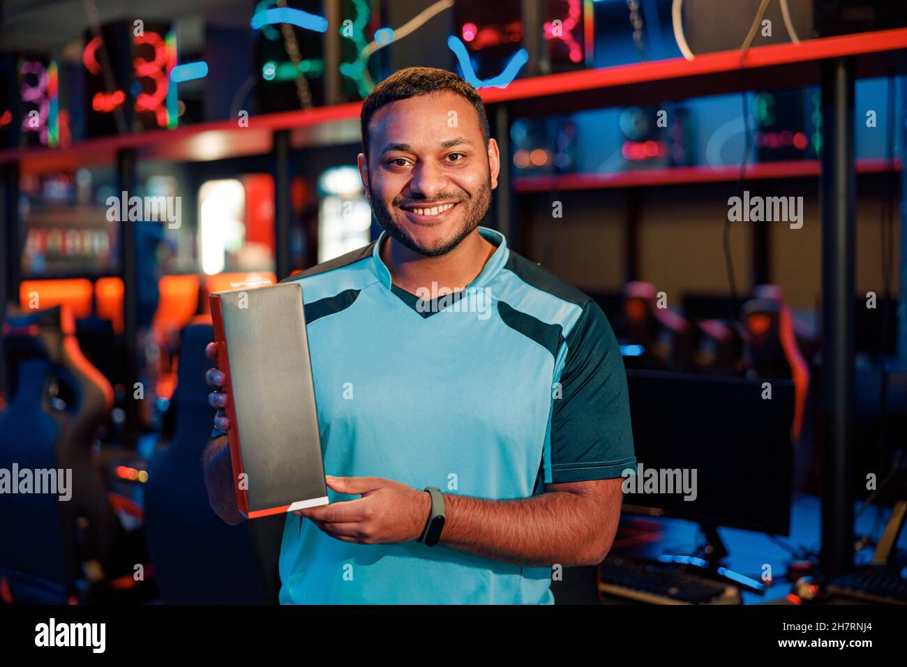 Male gamer succeed in gaming tournament in computer club Stock Photo ...