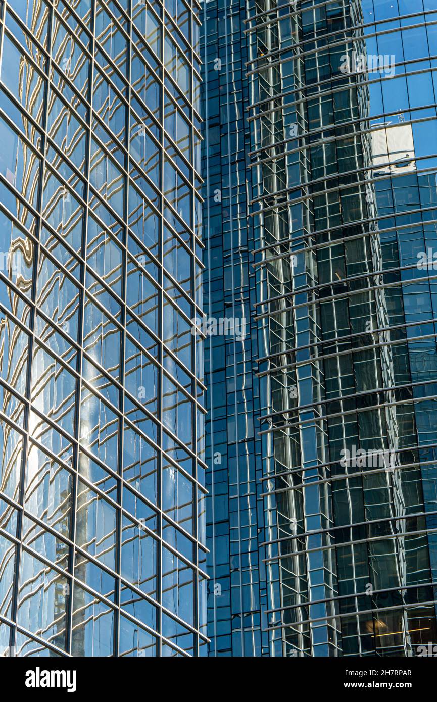 Vertical background of modern glass building Stock Photo - Alamy