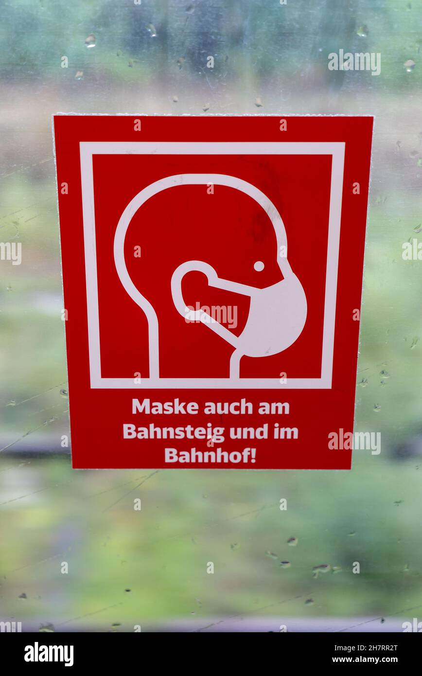 Red information sign with a symbol of the mask Stock Photo - Alamy