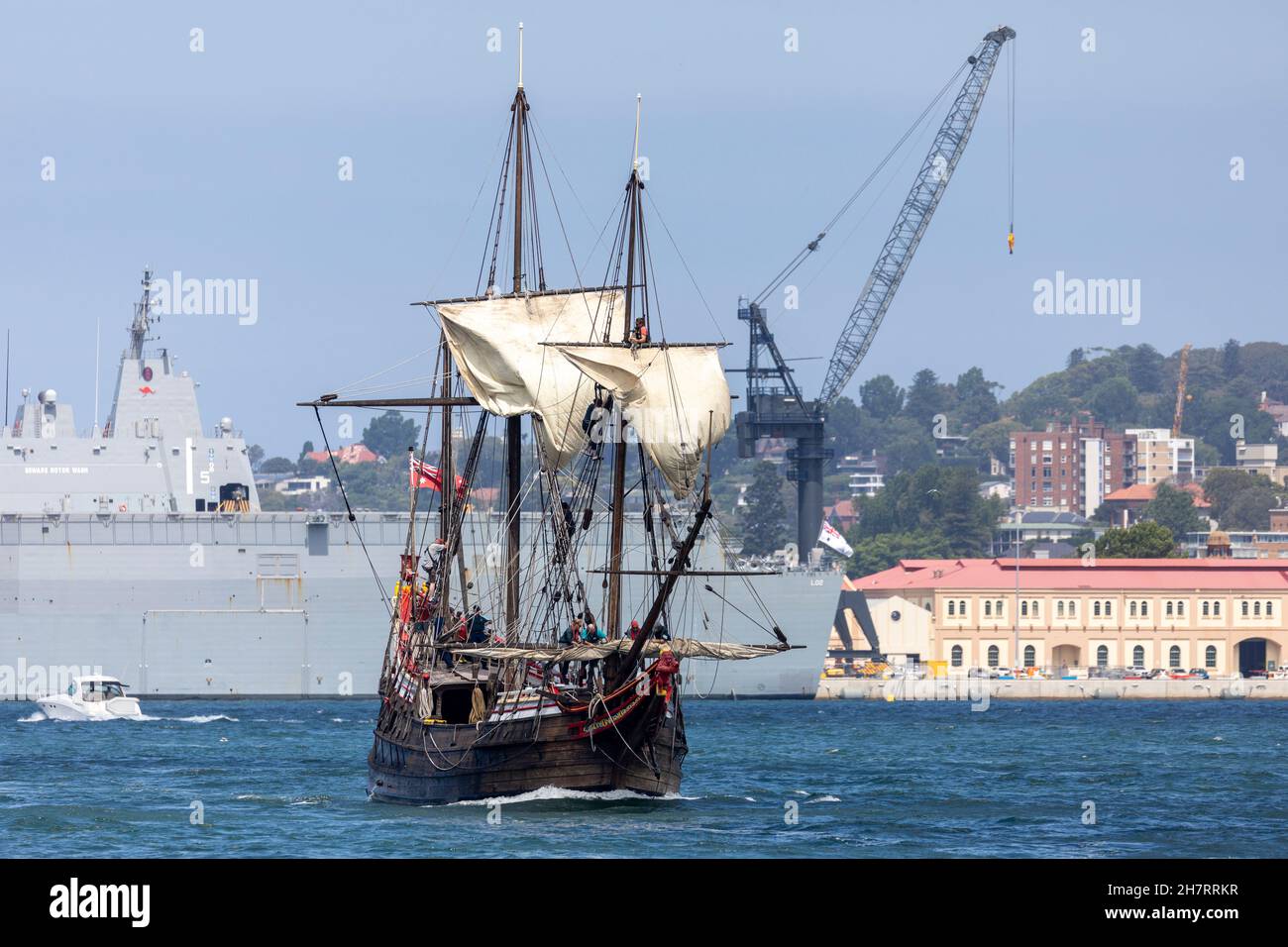 Traditional sailing boat on Sydney Harbour sailing past the australian ...