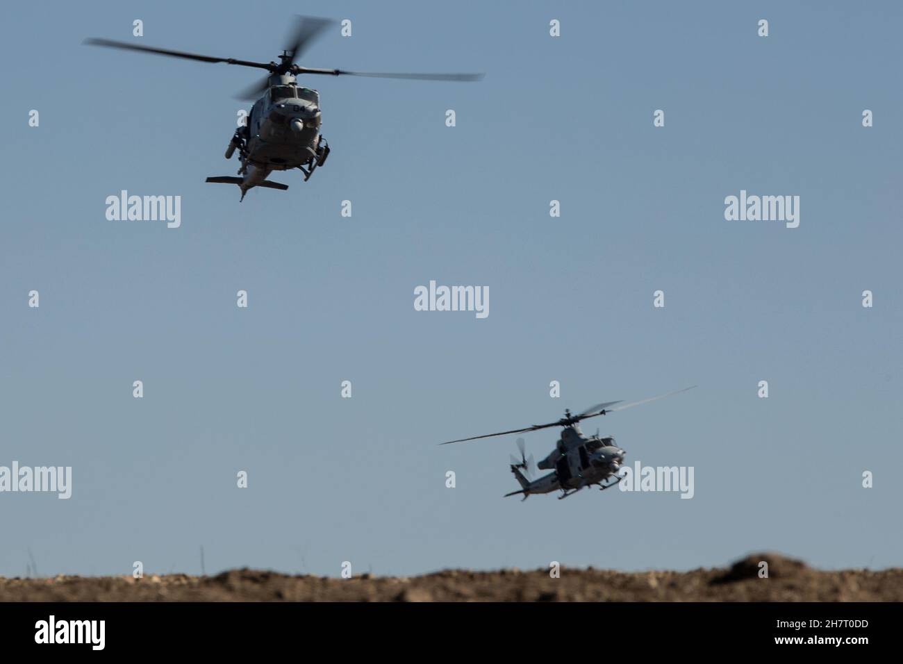 Two UH-1Y Venom helicopters with Marine Light Attack Helicopter ...
