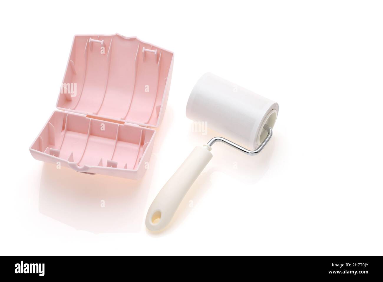 sticky roller cleaning, housework and housekeeping concept Stock Photo ...