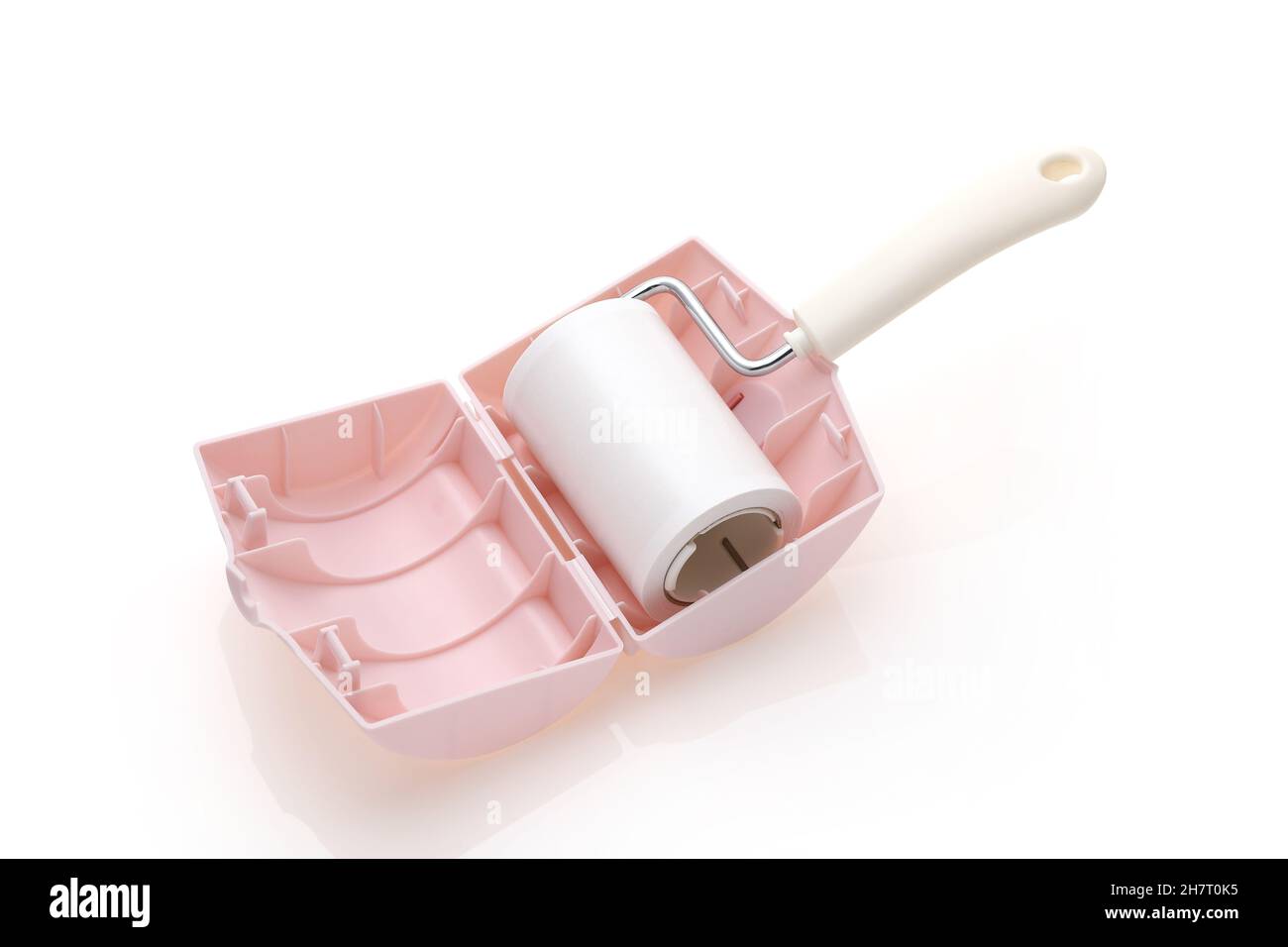 sticky roller cleaning, housework and housekeeping concept Stock Photo ...