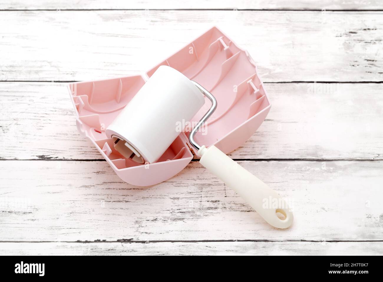 sticky roller cleaning, housework and housekeeping concept Stock Photo ...