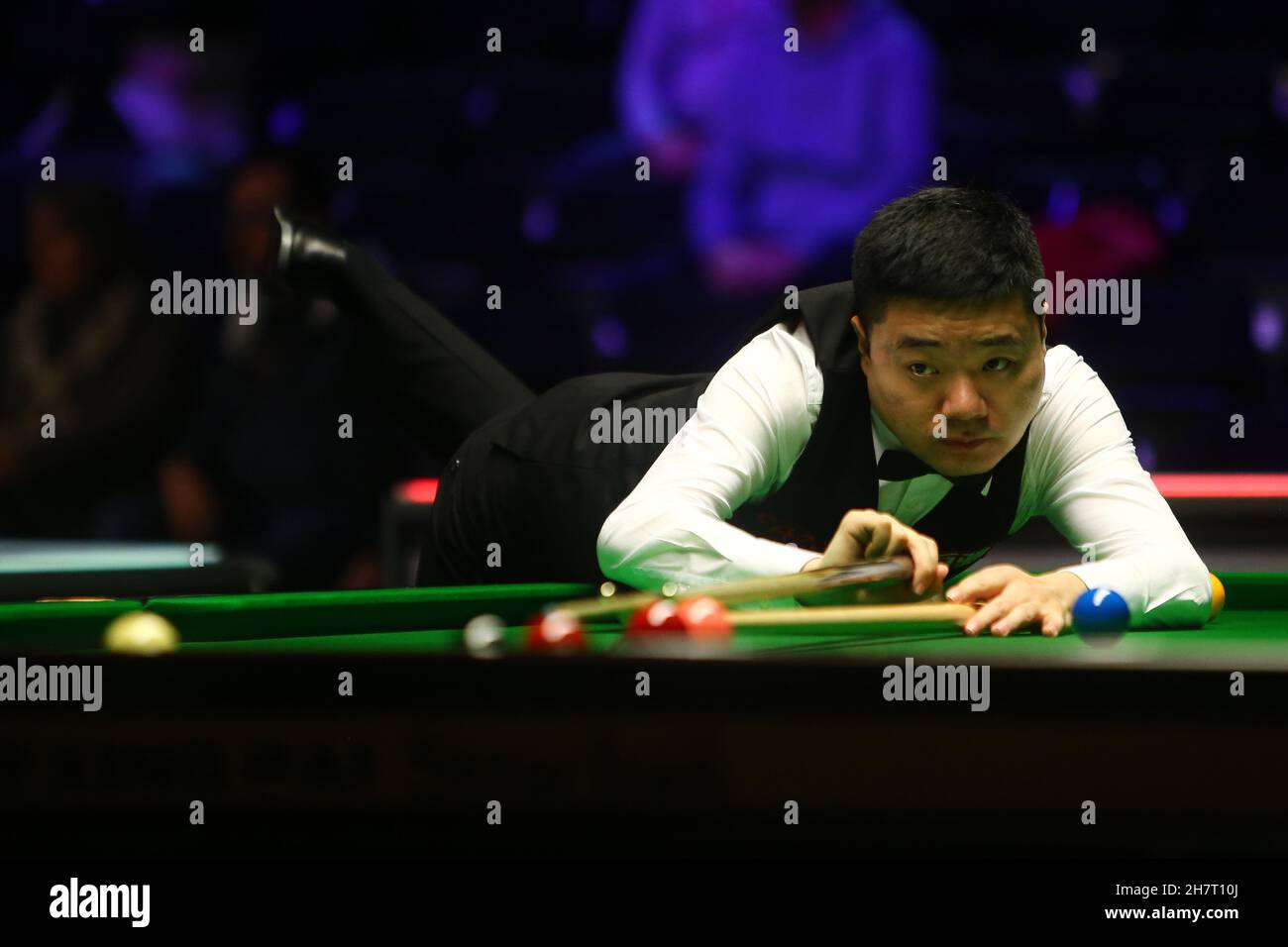 York. 24th Nov, 2021. Ding Junhui competes during the first round match ...