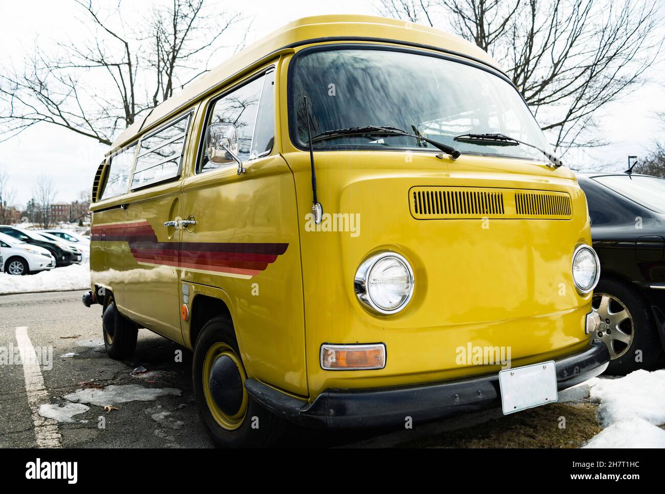 Classic vintage yellow Volkswagen Transporter camper van parked in ...