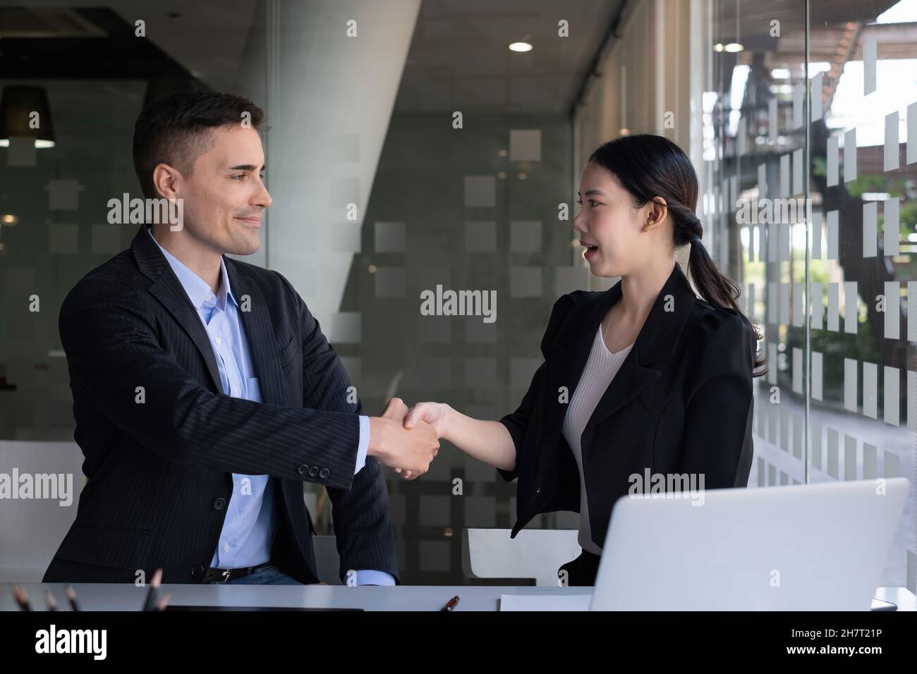 Businessman and partner handshake for the new agreement after sign in ...