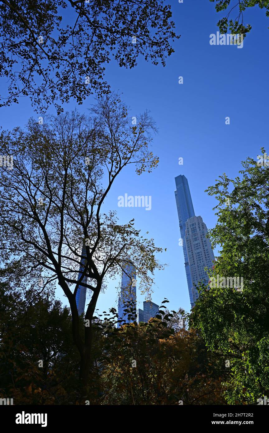 Central Park in New York with autumn foliage and skyscrapers in ...