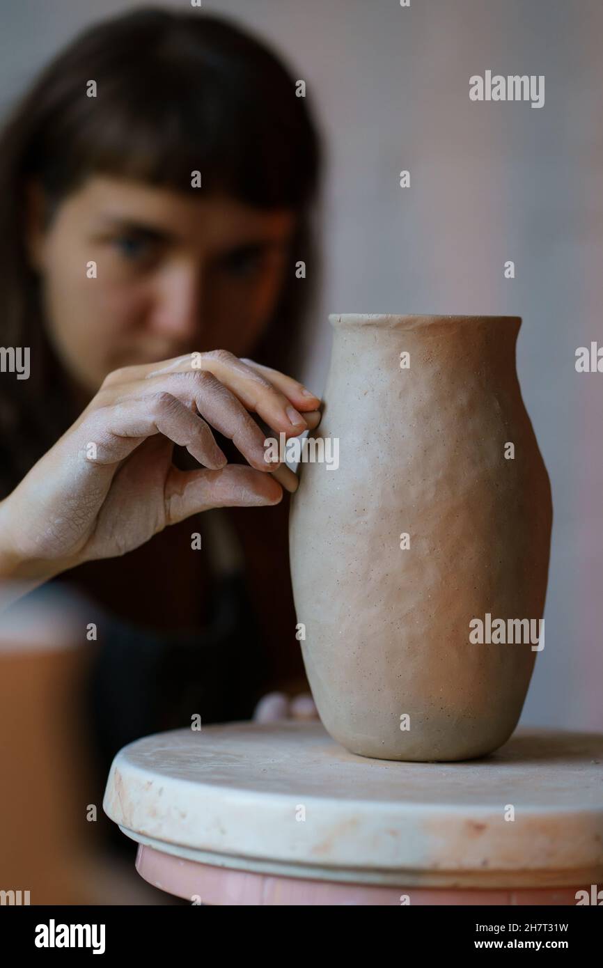 Handmade creation occupation: process of moulding and sculpturing ...