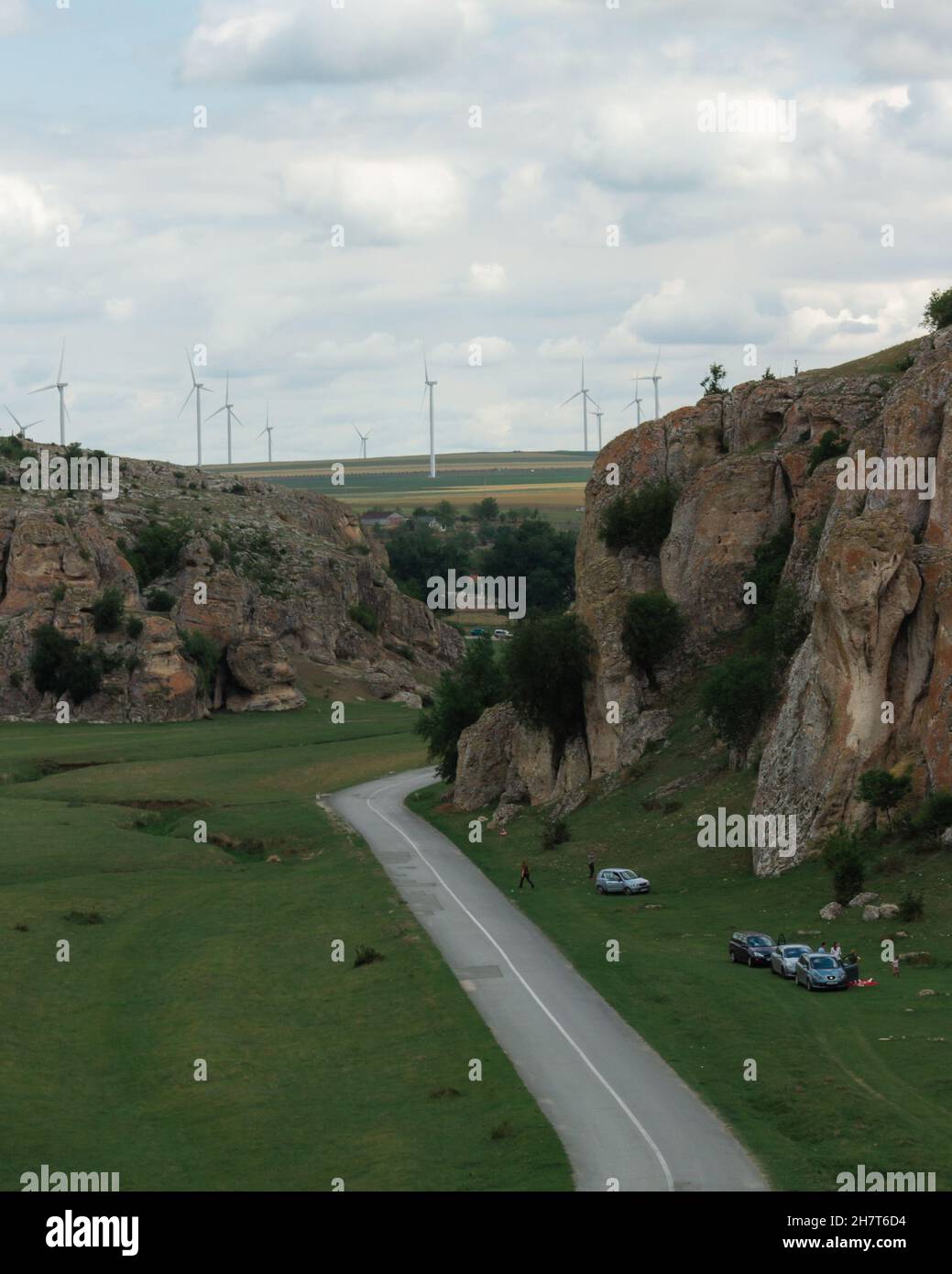 Vertical shot of a car racing road going through the rocks Stock Photo ...