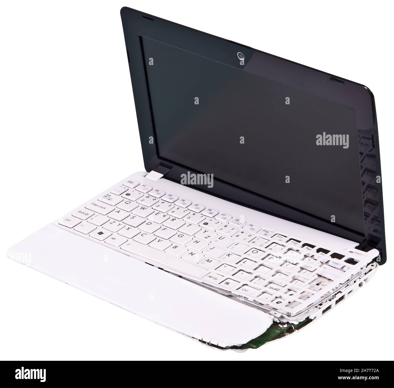 Closeup of a black and white laptop with broken base panel isolated on ...