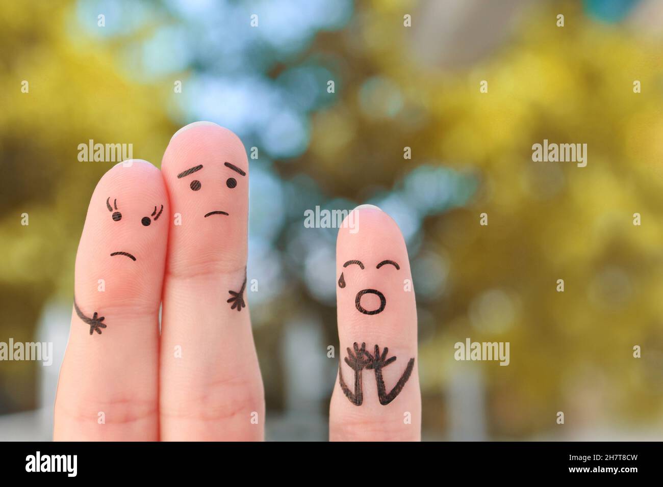 Fingers art of family during quarrel. Concept child is crying, parents ...