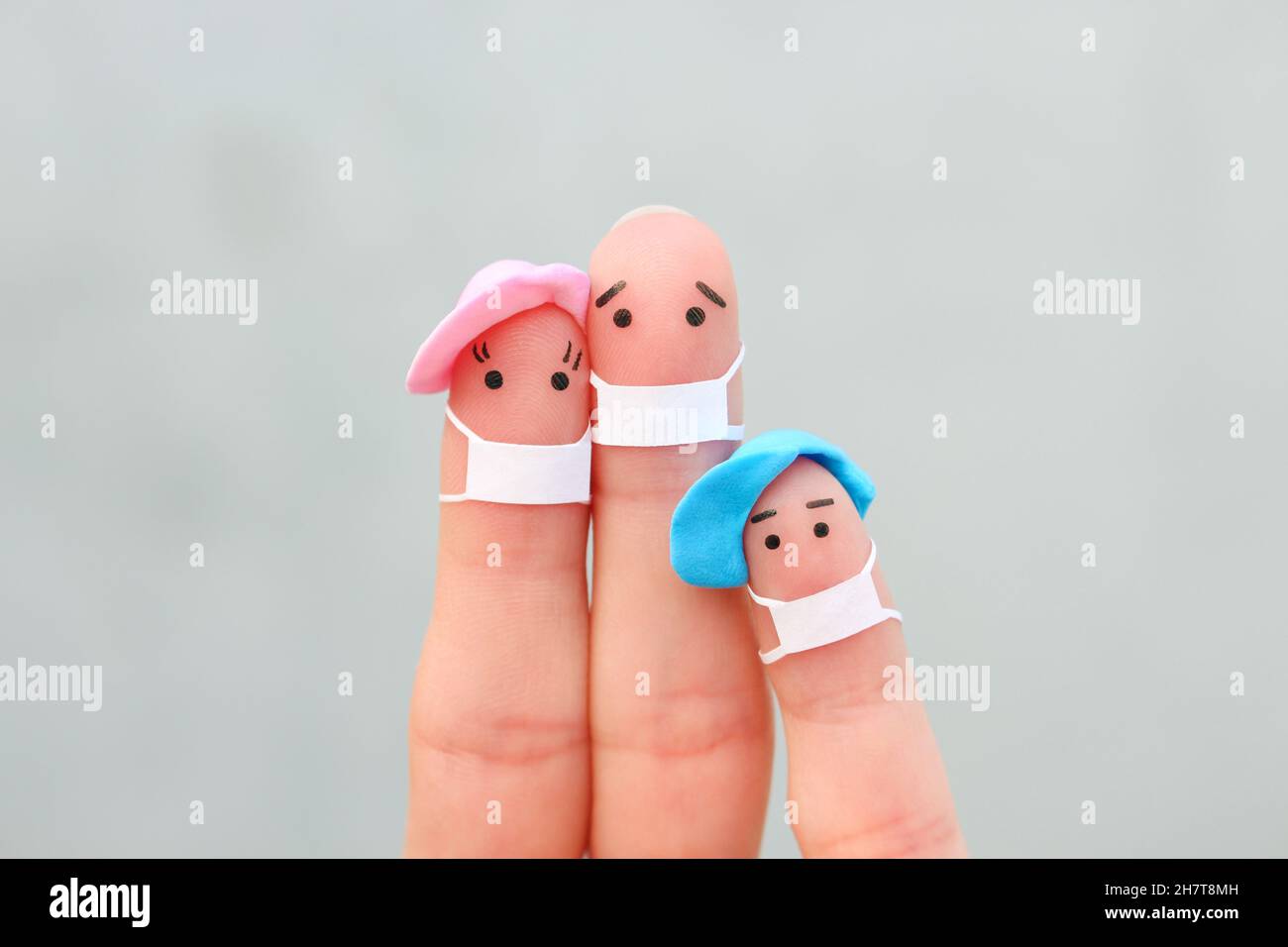 Fingers art of family with face mask Stock Photo - Alamy