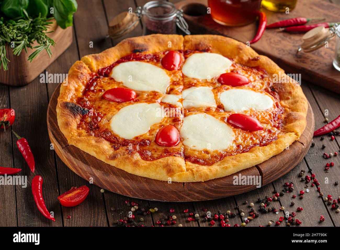 Pizza with mozzarella cheese and tomatoes Stock Photo - Alamy
