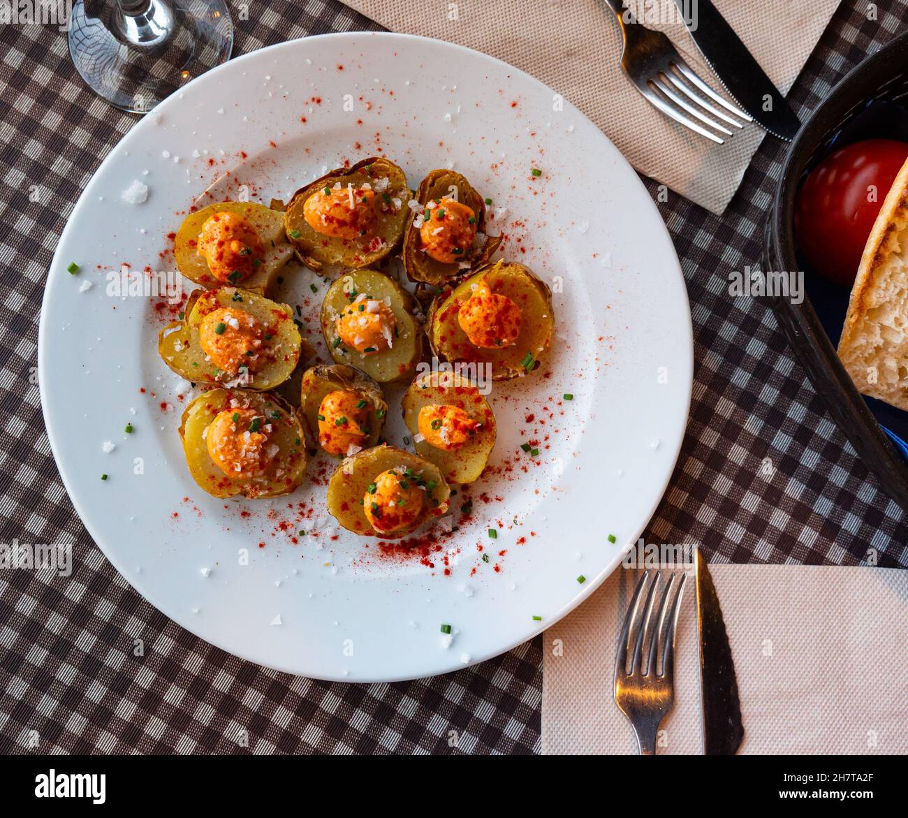 Spanish fried potatoes patatas bravas Stock Photo - Alamy