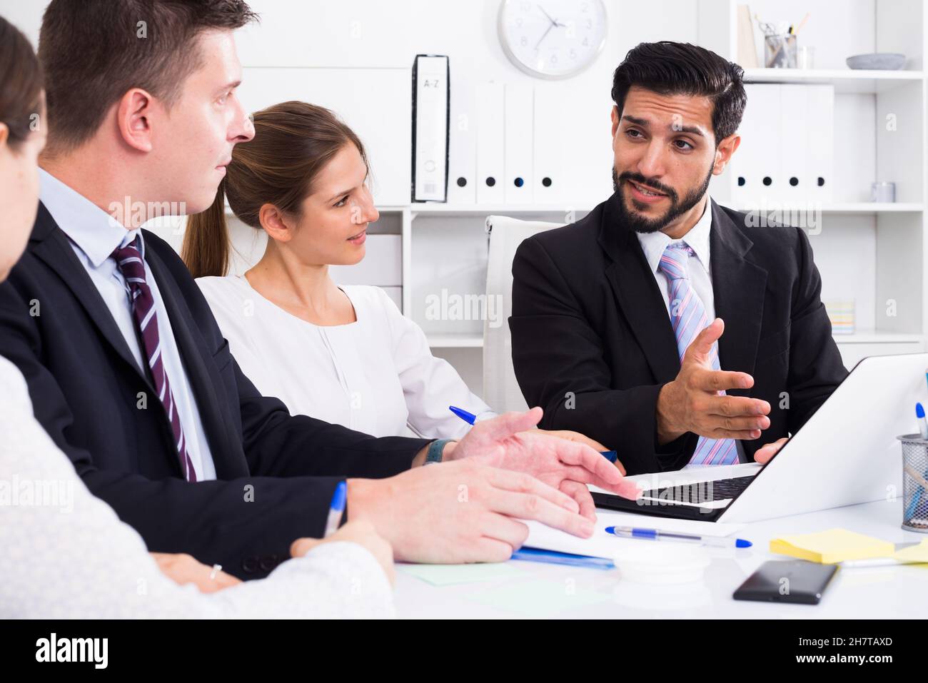 Men discussing presentation hi-res stock photography and images - Alamy
