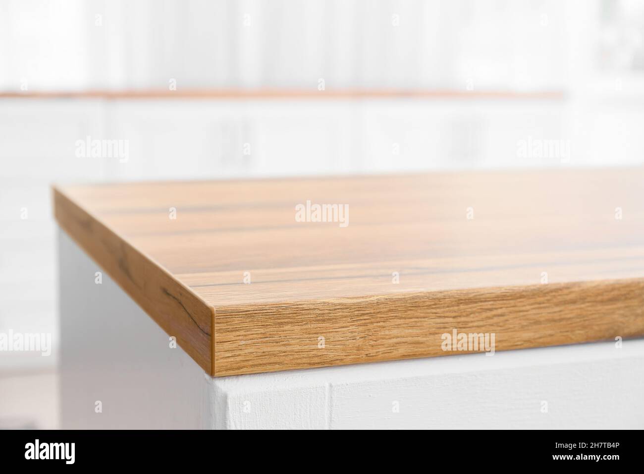 Wooden table top in modern kitchen, closeup Stock Photo - Alamy