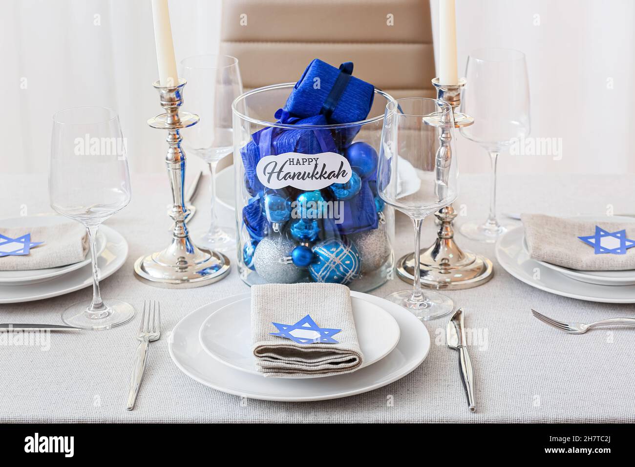 Beautiful table setting for Hanukkah celebration in dining room Stock ...