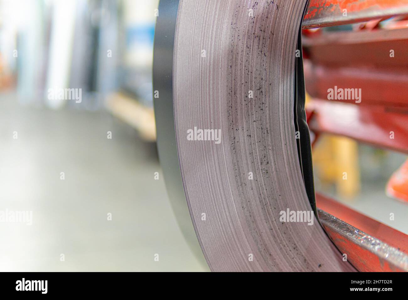 Metal coil on Decolier with custom metal flashing in background Stock ...