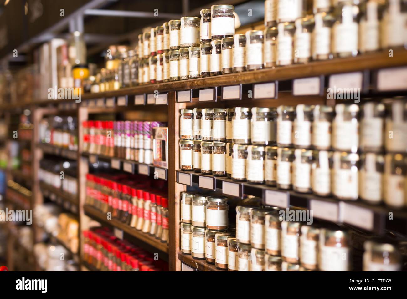 Spices on shelves in store Stock Photo - Alamy