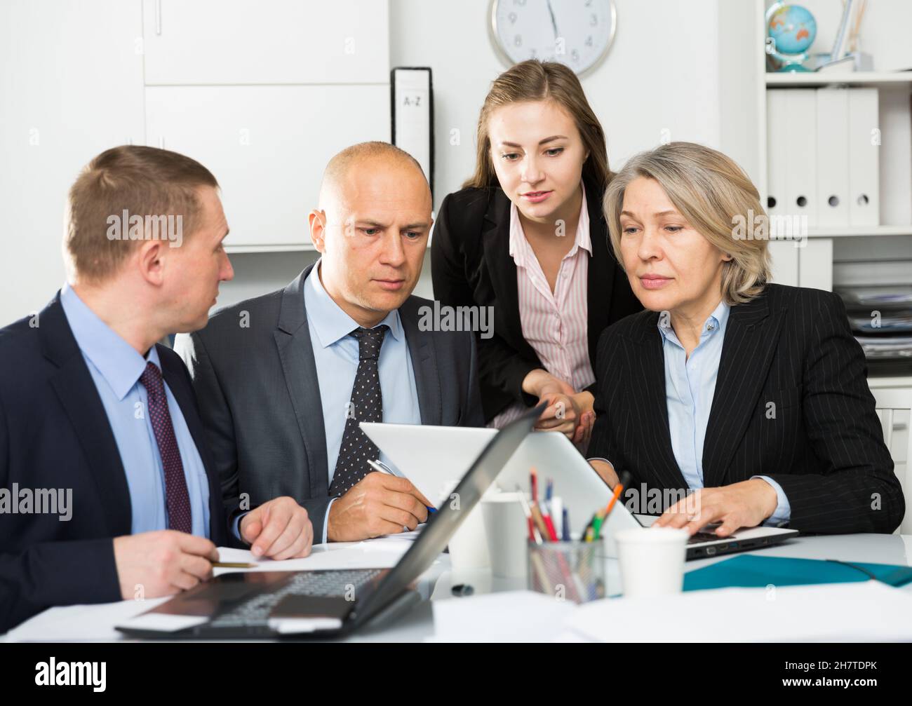 Business team working at office Stock Photo - Alamy
