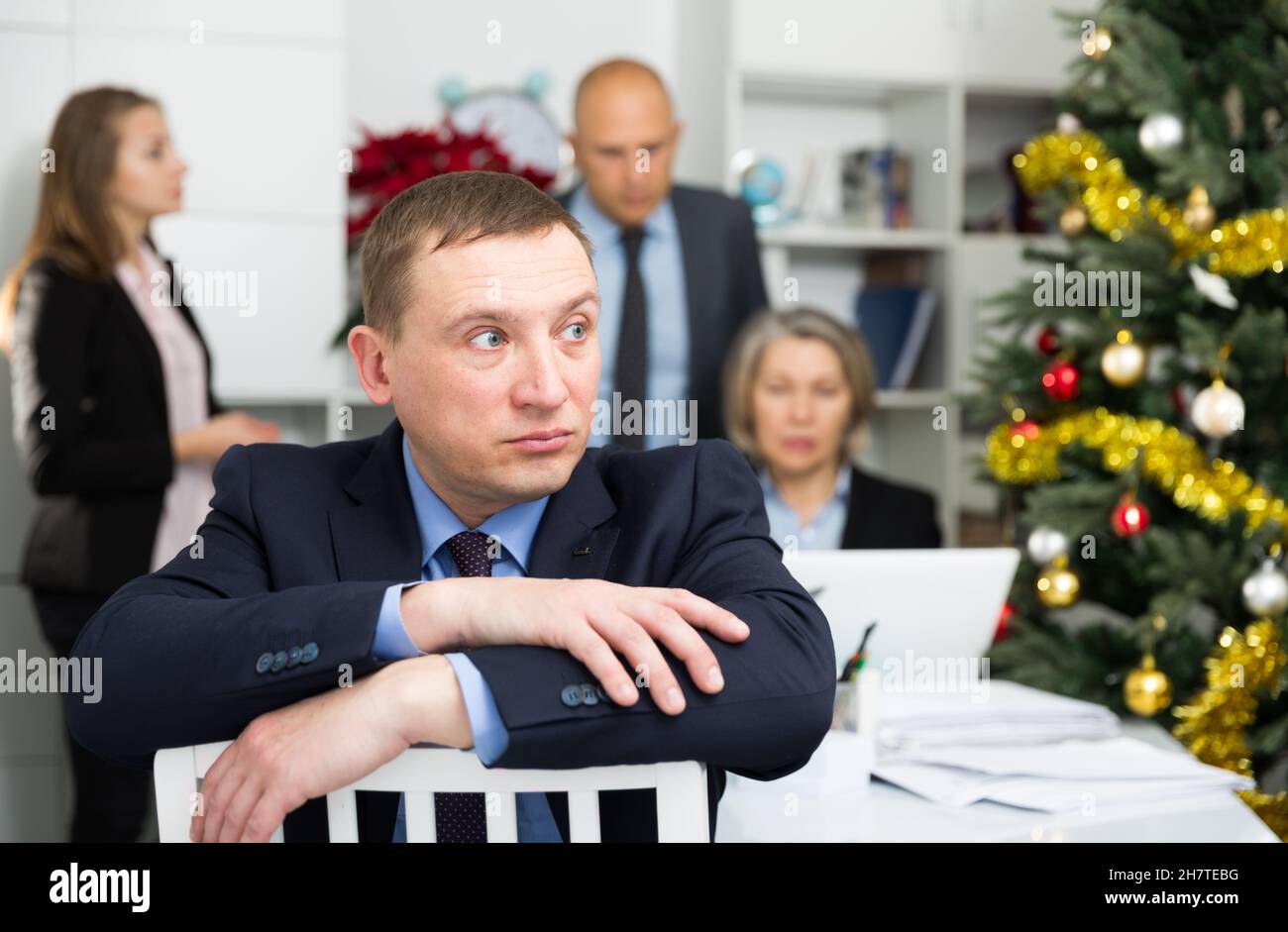 Frustrated european man sitting hi-res stock photography and images - Alamy