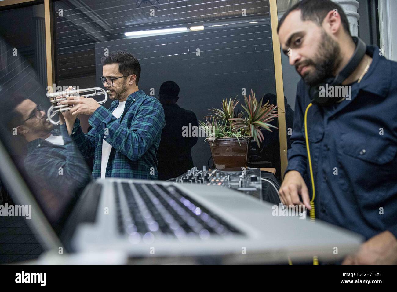 Trumpet and turntable musician setting the event, during the art and ...