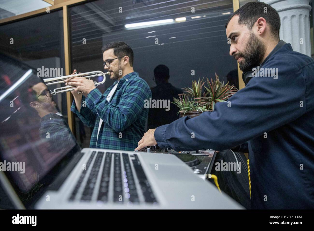 Trumpet and turntable musician setting the event, during the art and ...