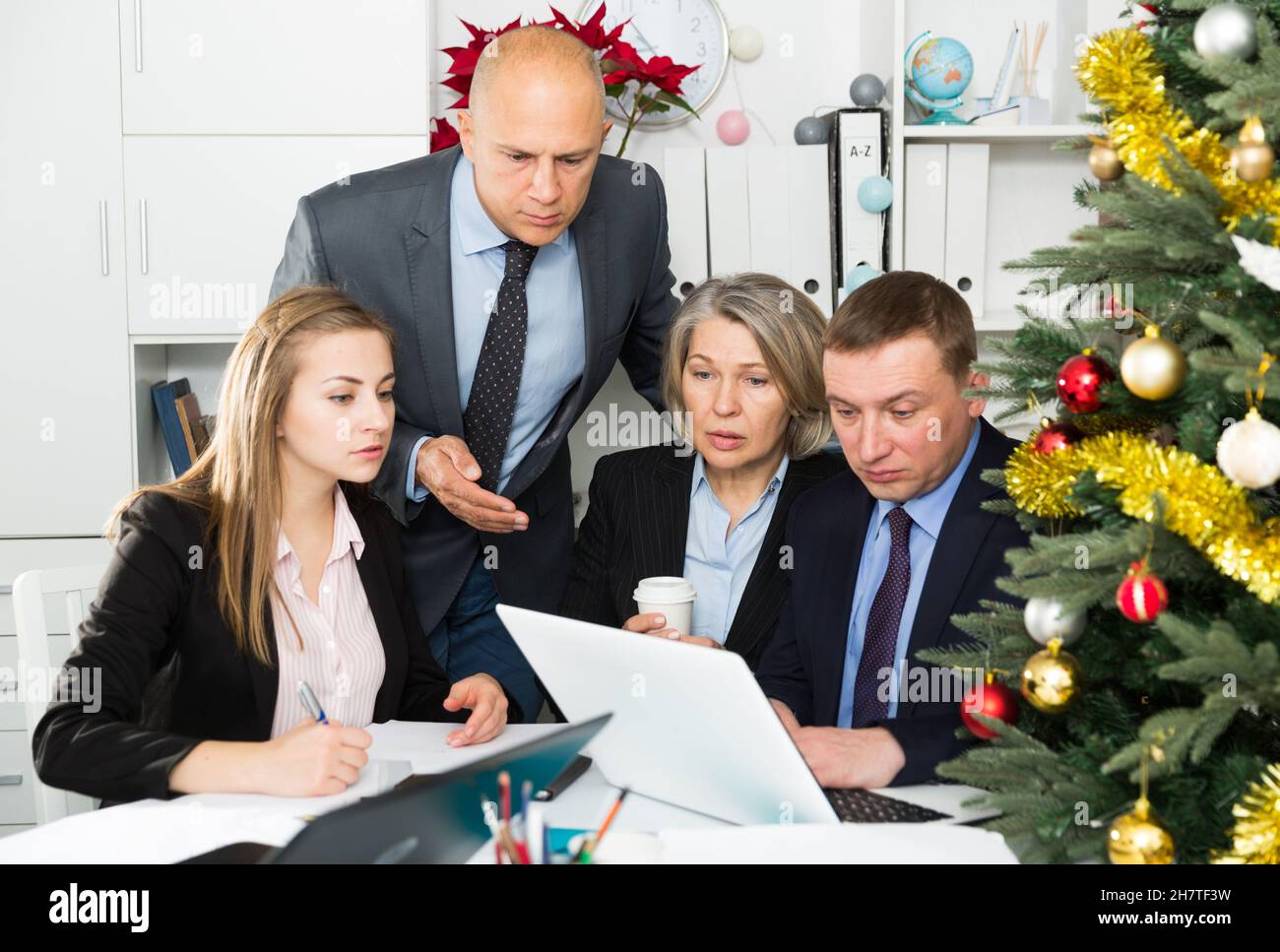 Boss controlling teamwork Stock Photo - Alamy