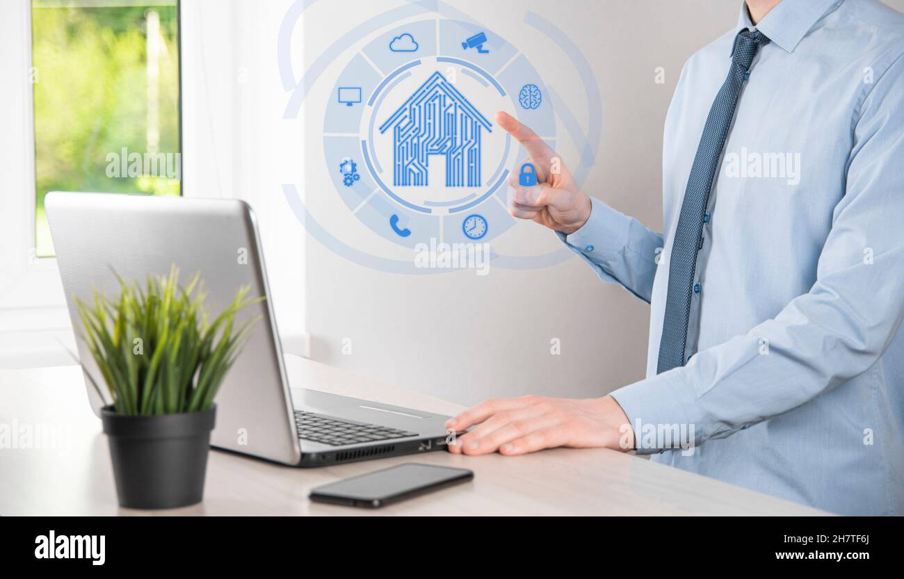Businessman hold house icon.Smart home controlled, intelligent house ...