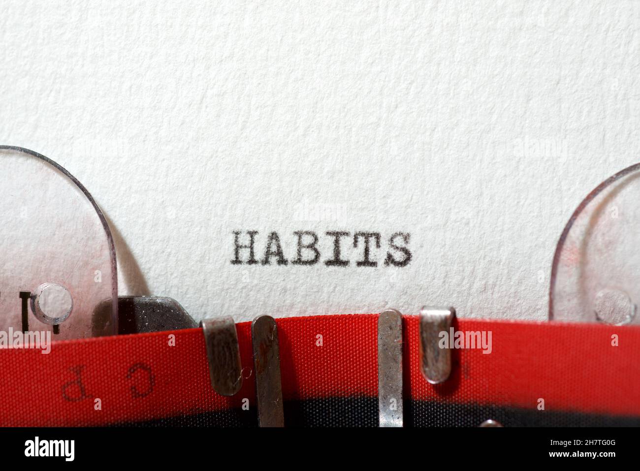 The word habits written with a typewriter Stock Photo - Alamy